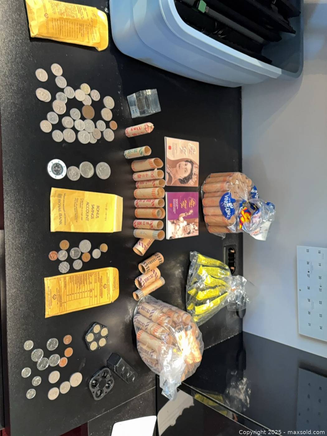 World and Canadian coins, rolls, wrappers, keepsake booklets | Maxsold