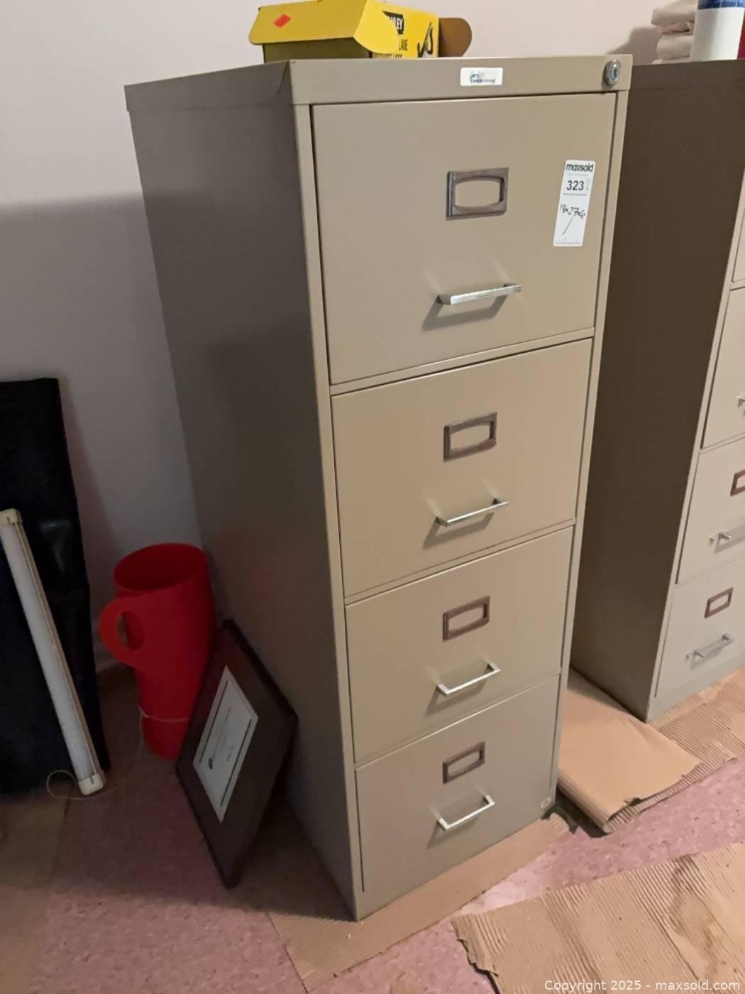Commander metal 4-drawer filing cabinet | Maxsold