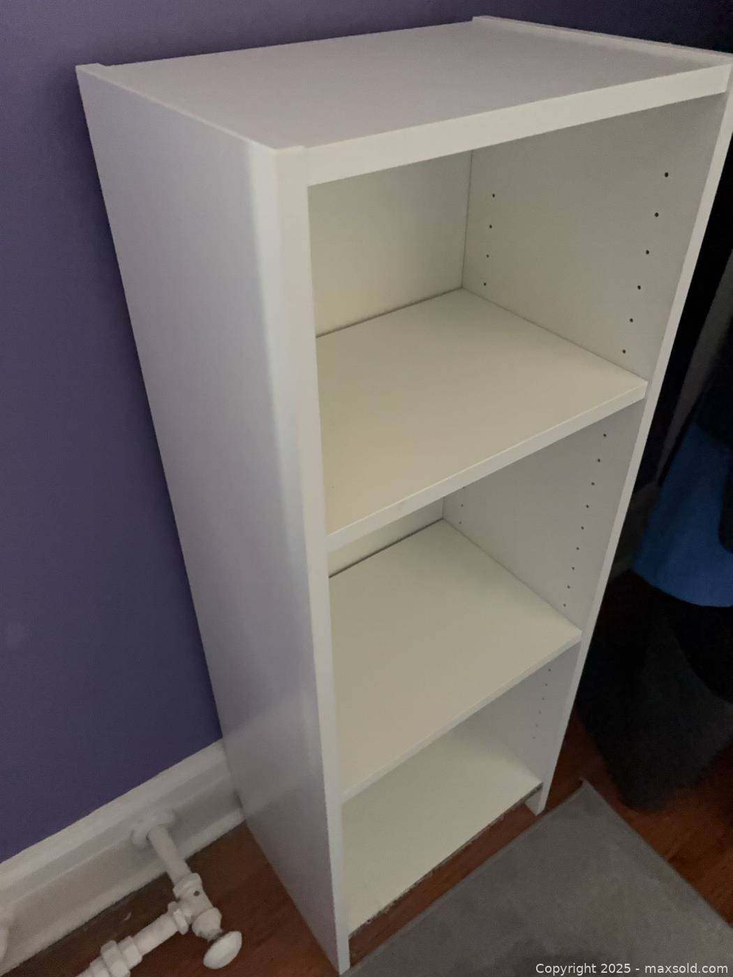 IKEA short and tall white bookcases | Maxsold