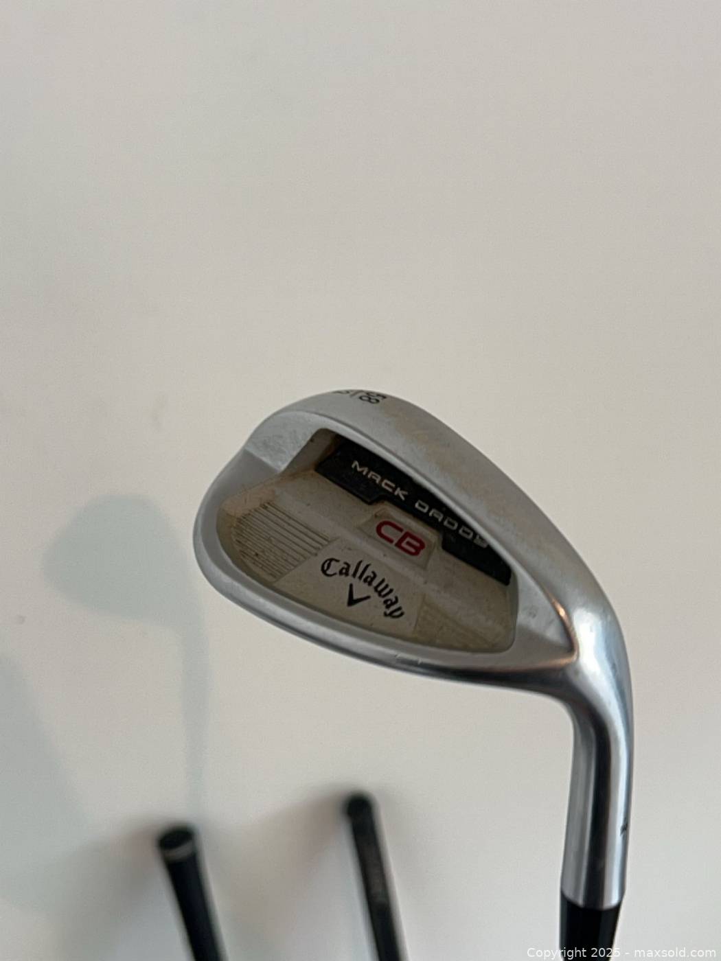 Odyssey right-handed putter, Cleveland 56° wedge, Callaway 58° wedge ...