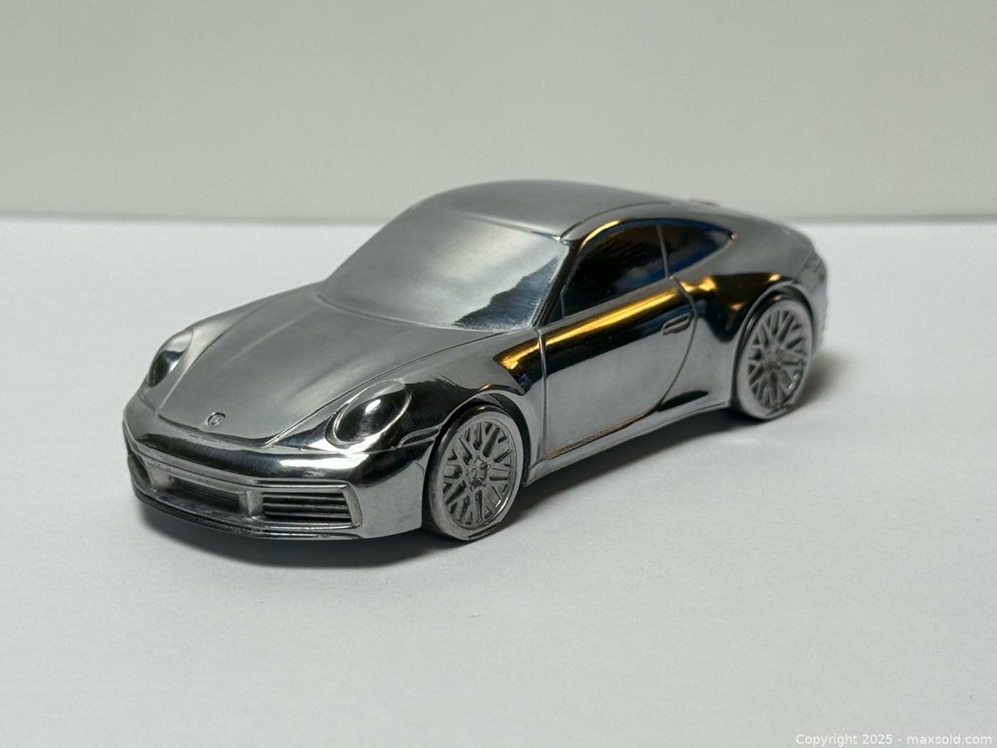 Porsche 911 992 cast aluminium paperweight | Maxsold
