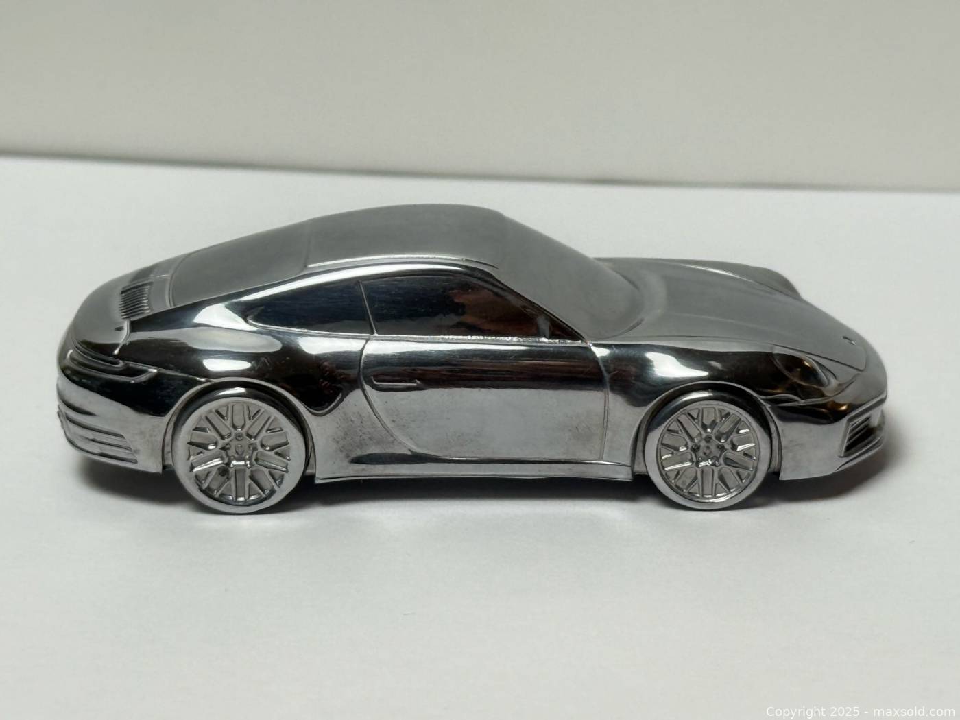 Porsche 911 992 cast aluminium paperweight | Maxsold