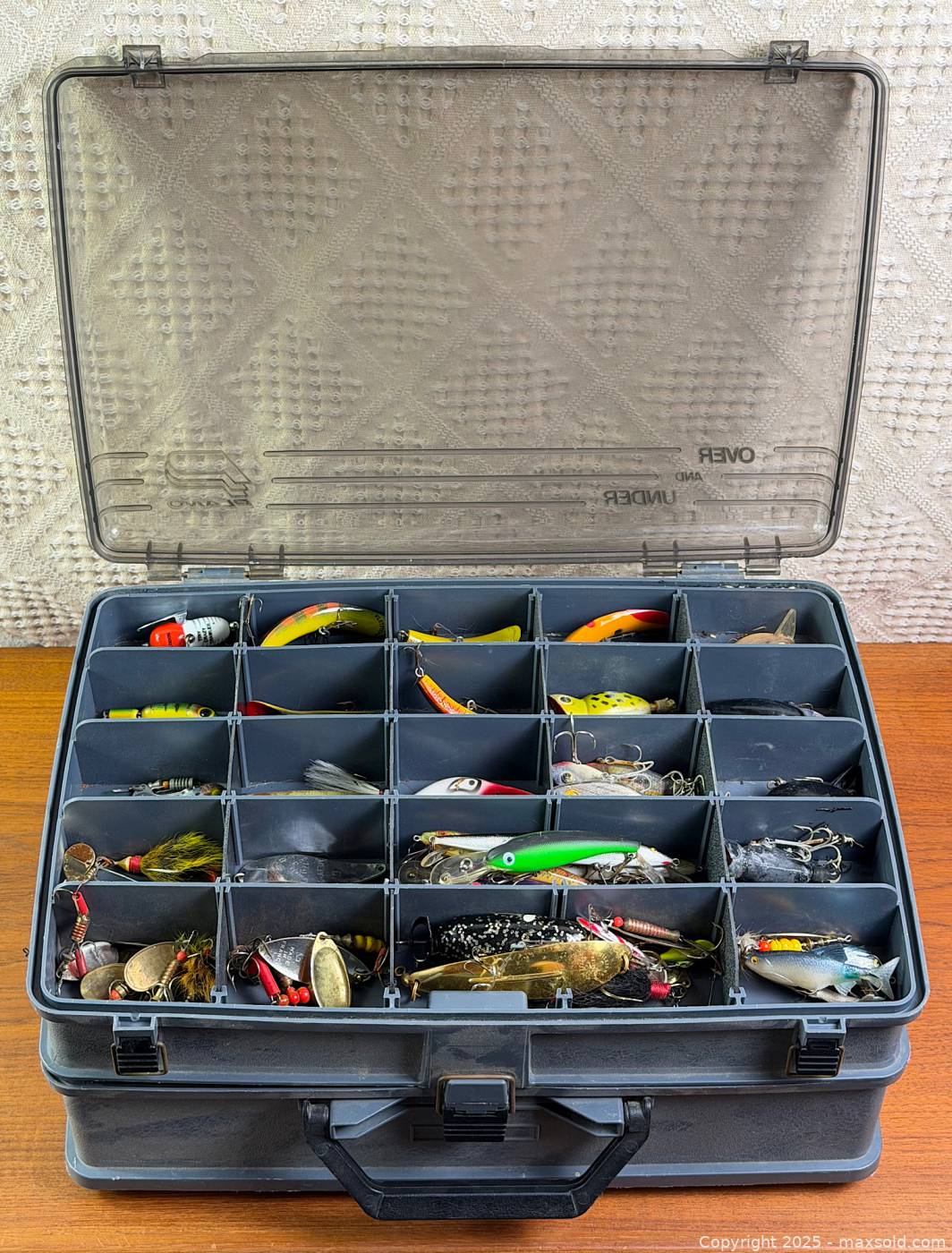 Large tackle box with assorted lures | Maxsold