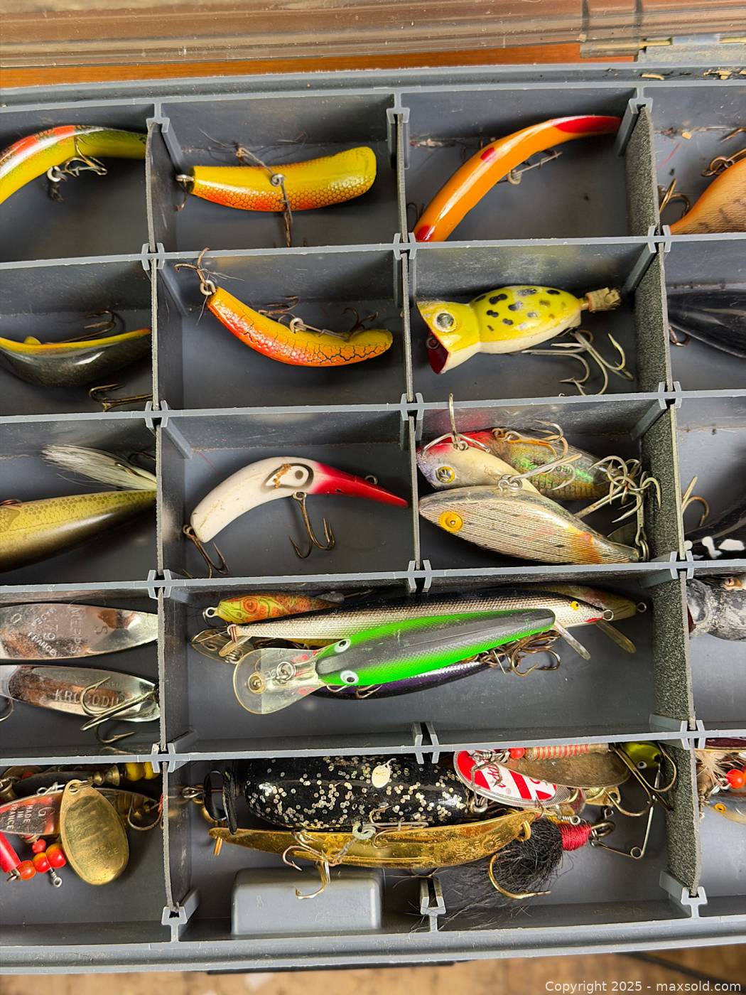 Large tackle box with assorted lures | Maxsold