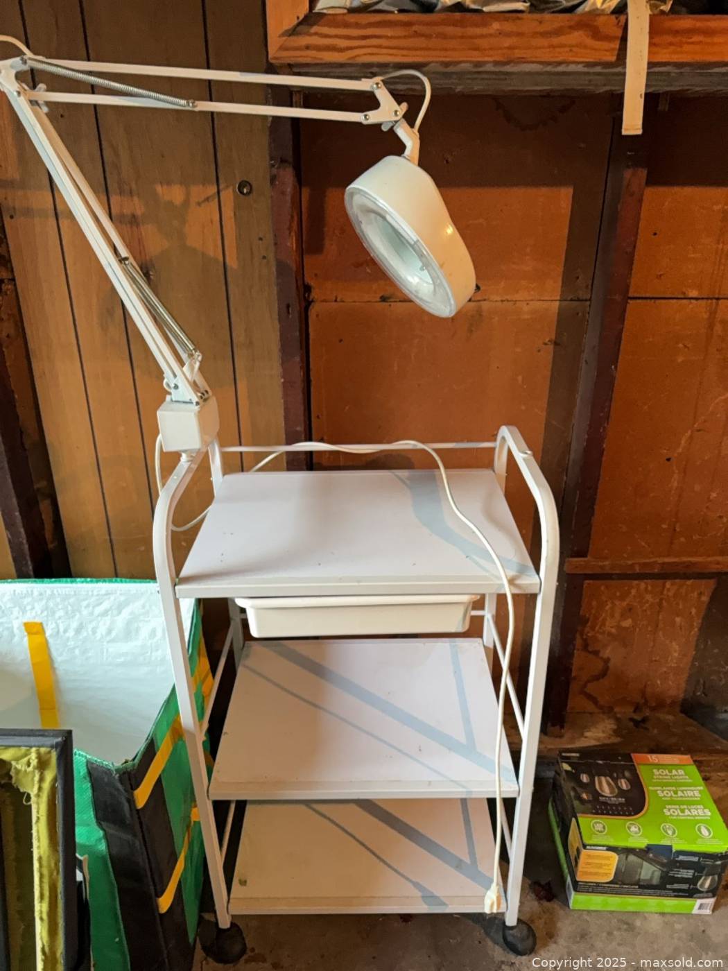 White metal rolling cart with pull-out bin, shelf and magnifying lamp ...