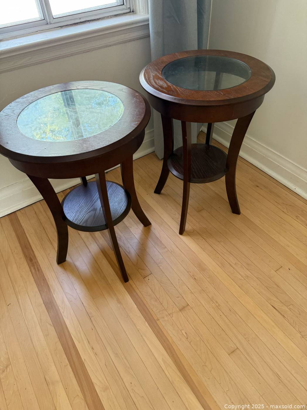 Dark wood two-drawer side tables | Maxsold