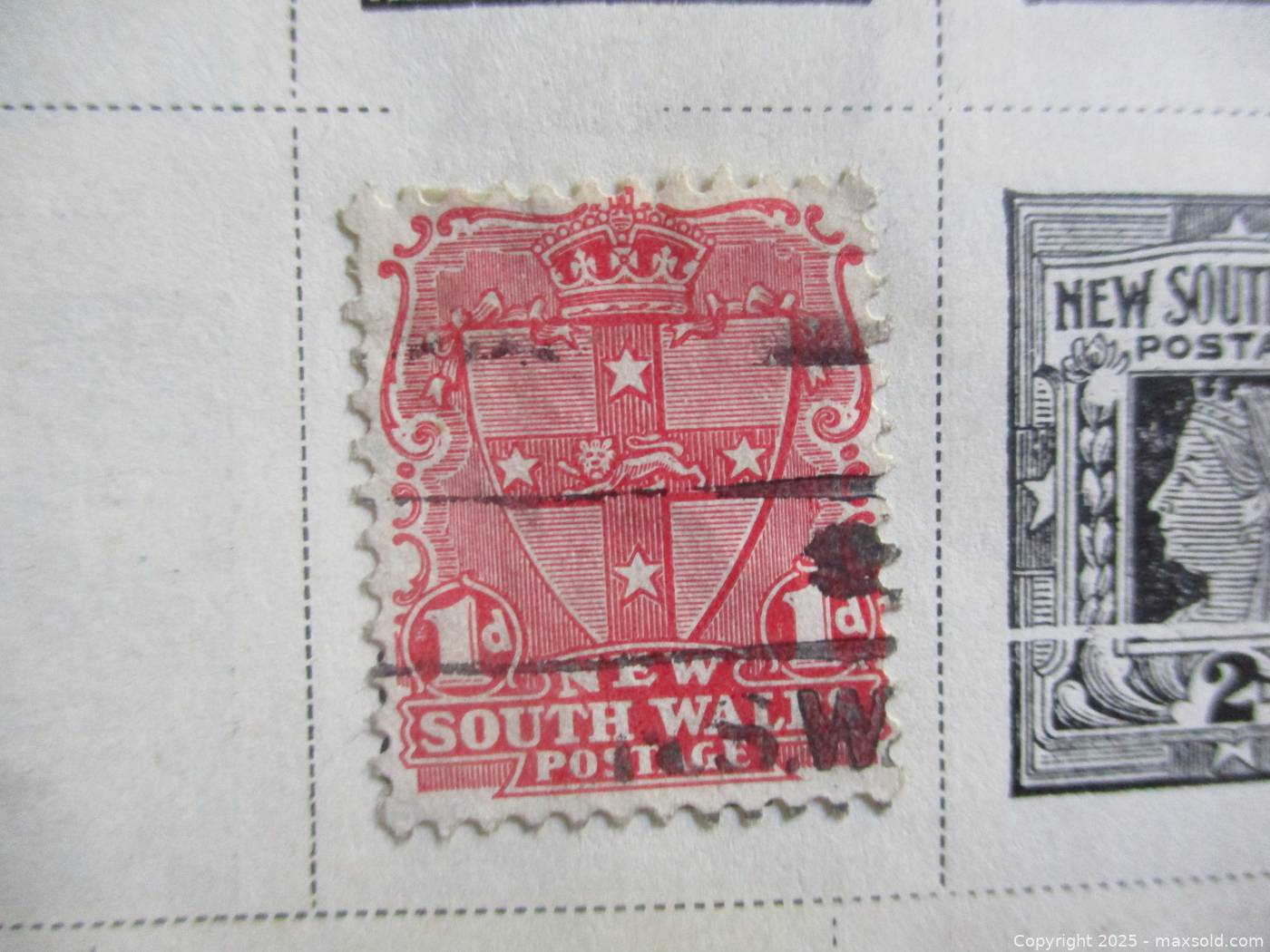New South Wales postage stamps on Scott album page | Maxsold