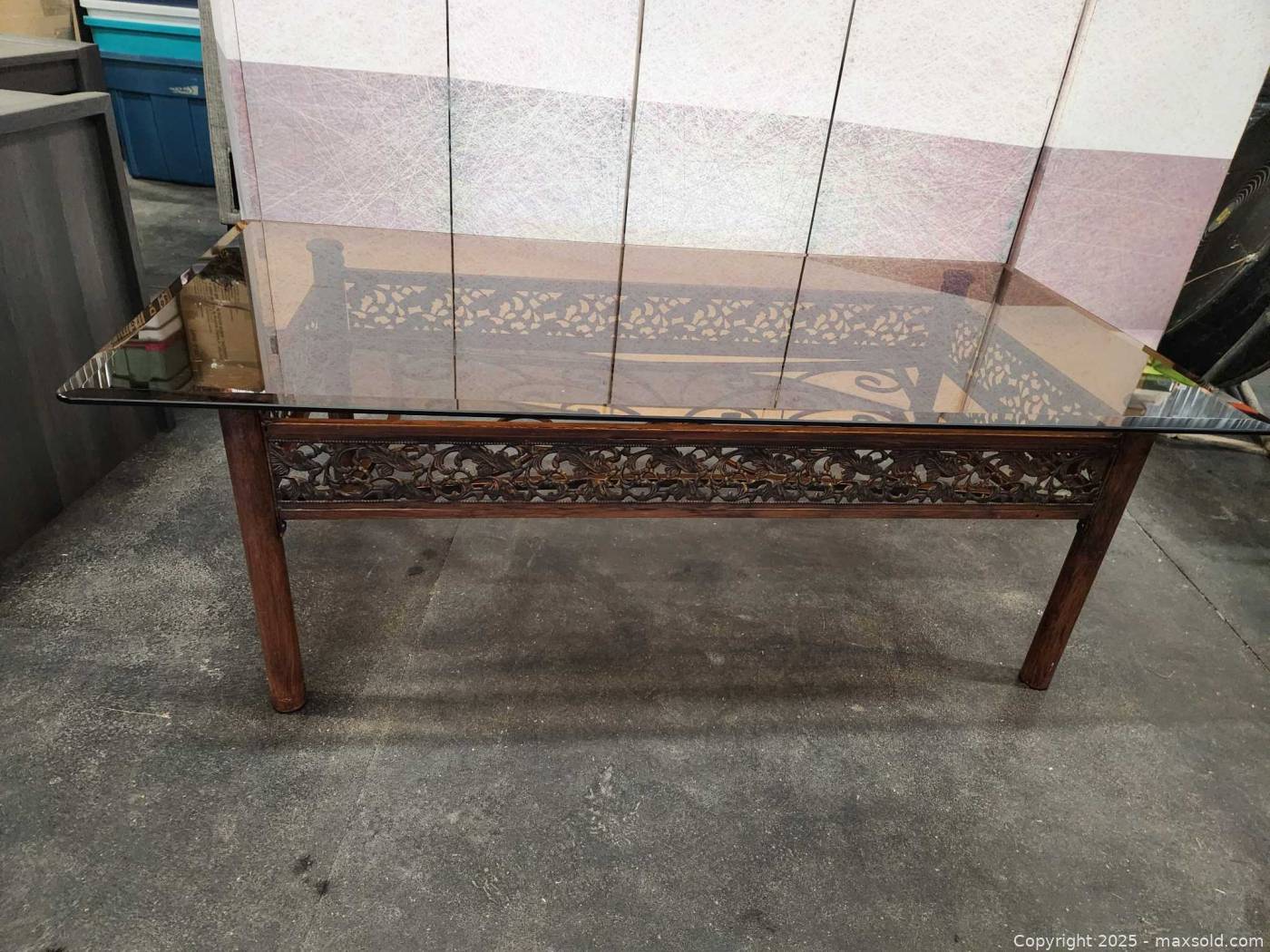 Glass top metal coffee table 48x24x17 in | Maxsold