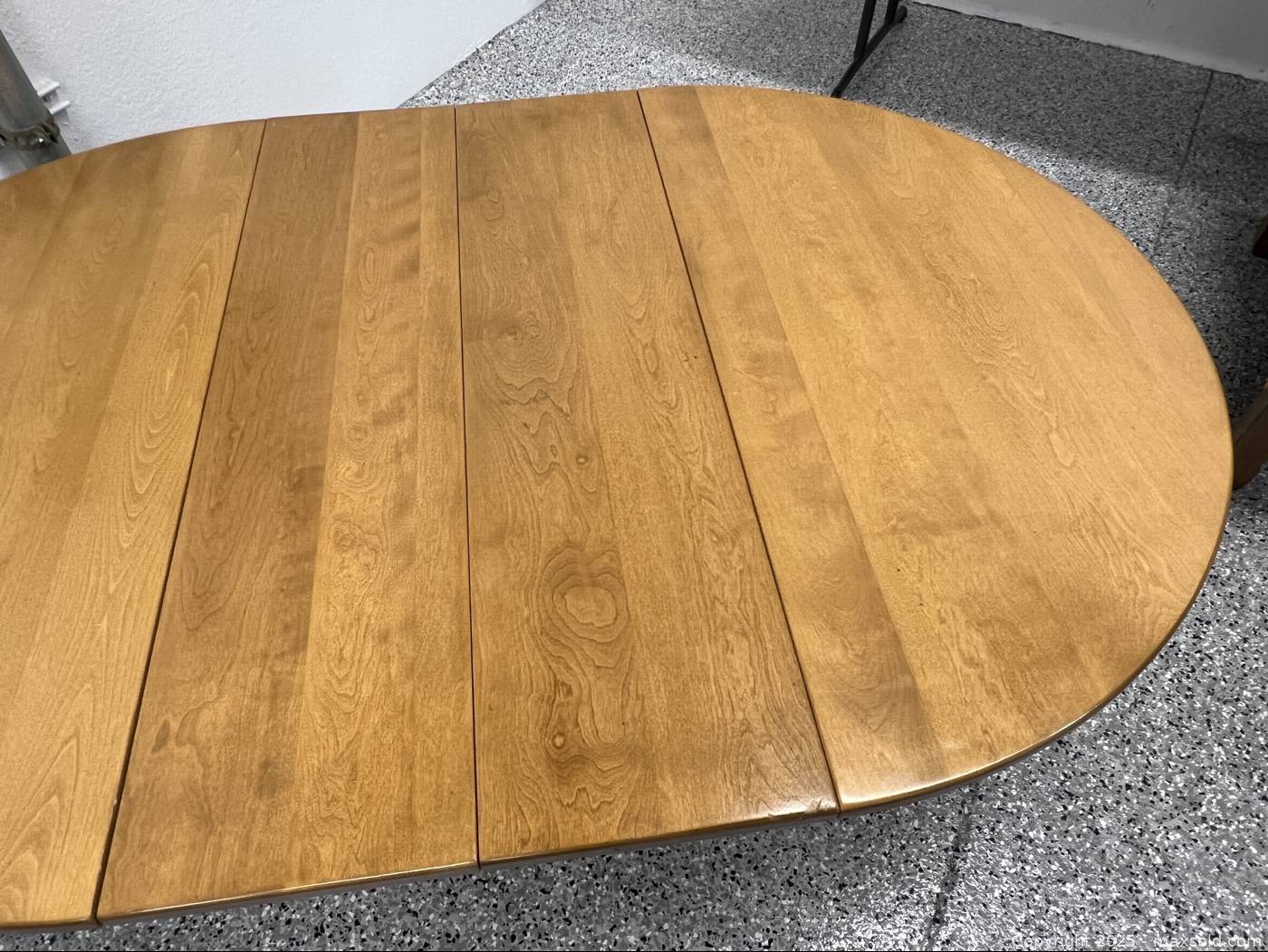 Conant Ball blonde wood low table with two 12" leaves | Maxsold