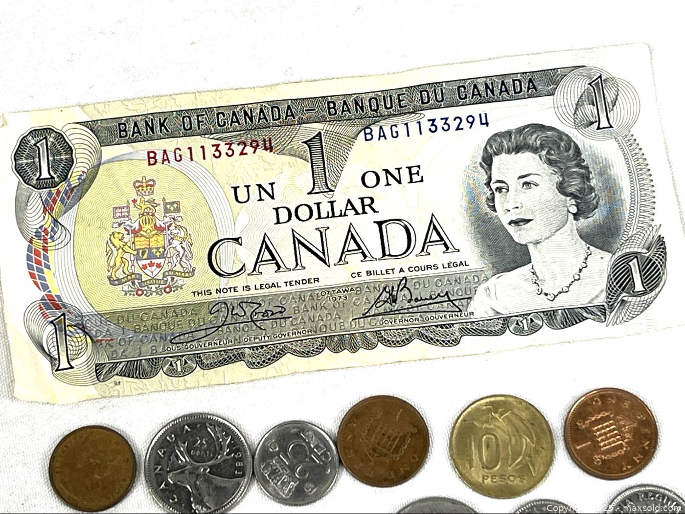 Canadian $1 Banknote, Italian AMC Notes & Mixed Coins | Maxsold