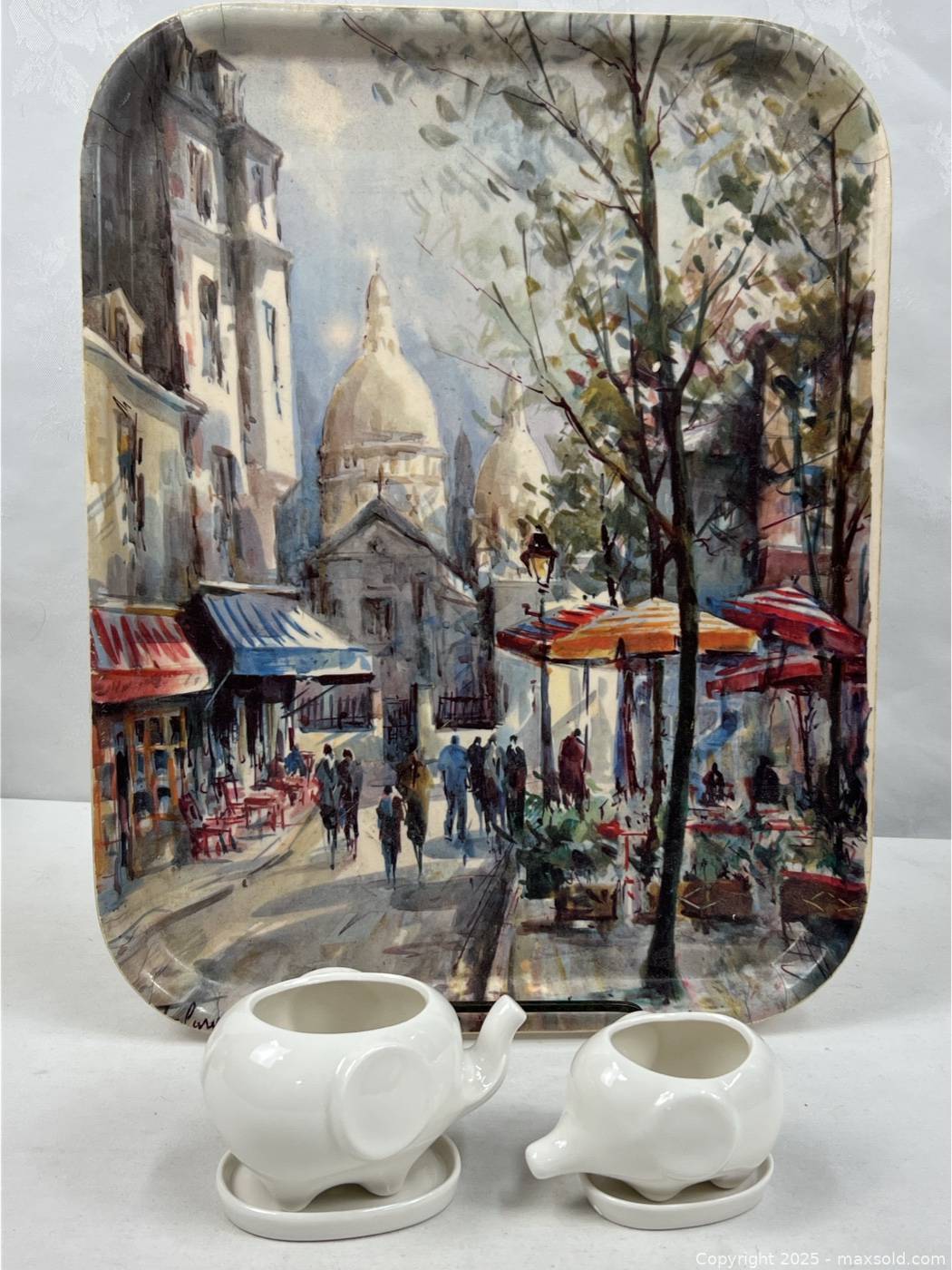 Paris scene plastic tray and 2 white ceramic elephant planters | Maxsold