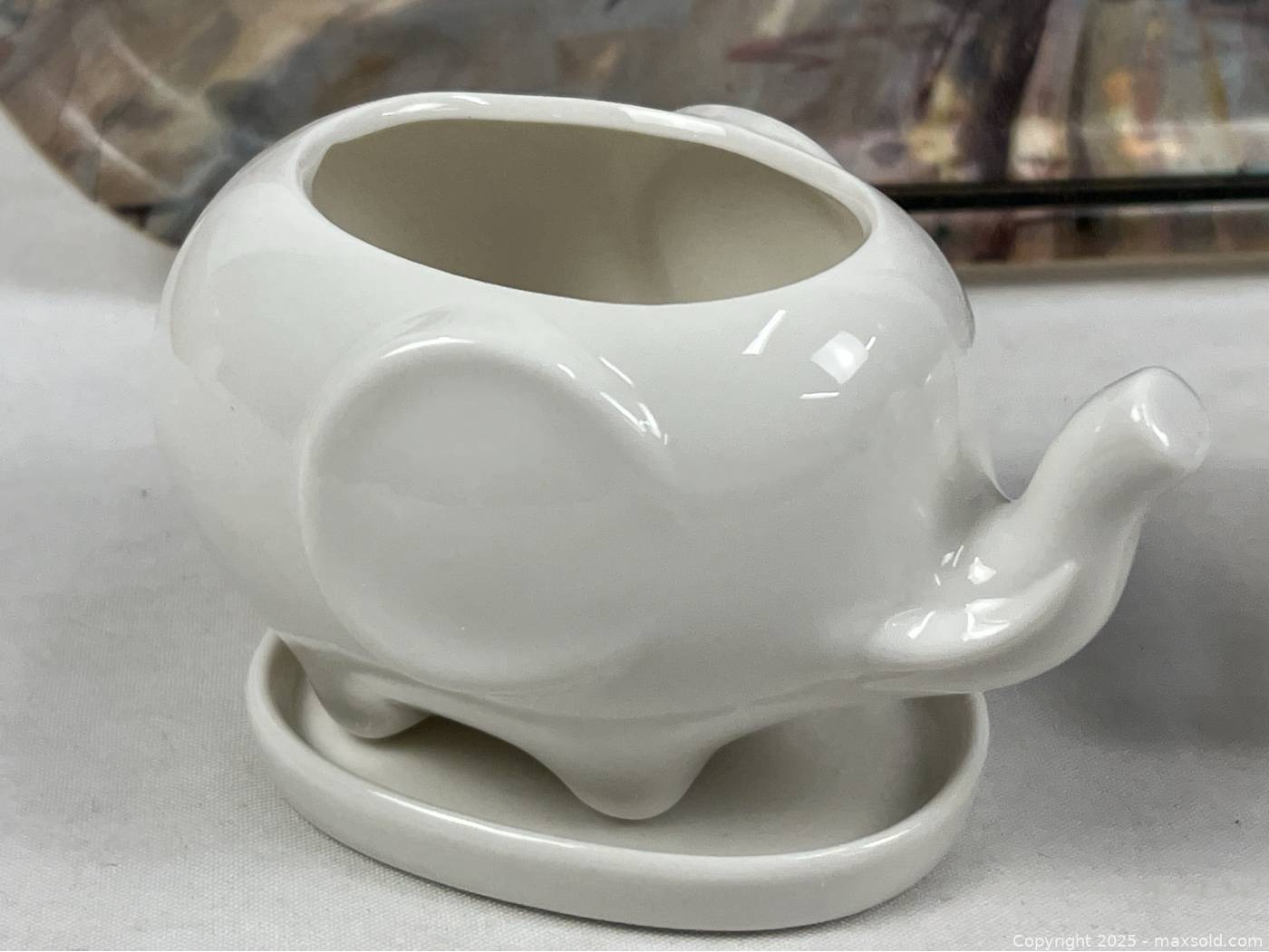 Paris scene plastic tray and 2 white ceramic elephant planters | Maxsold