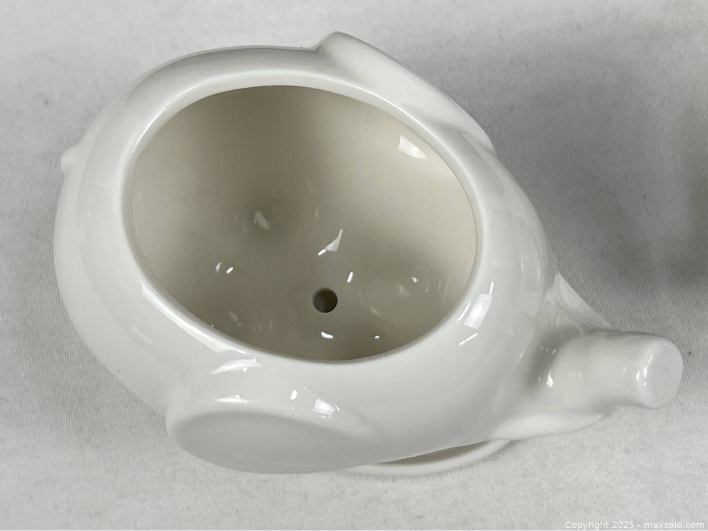 Paris scene plastic tray and 2 white ceramic elephant planters | Maxsold