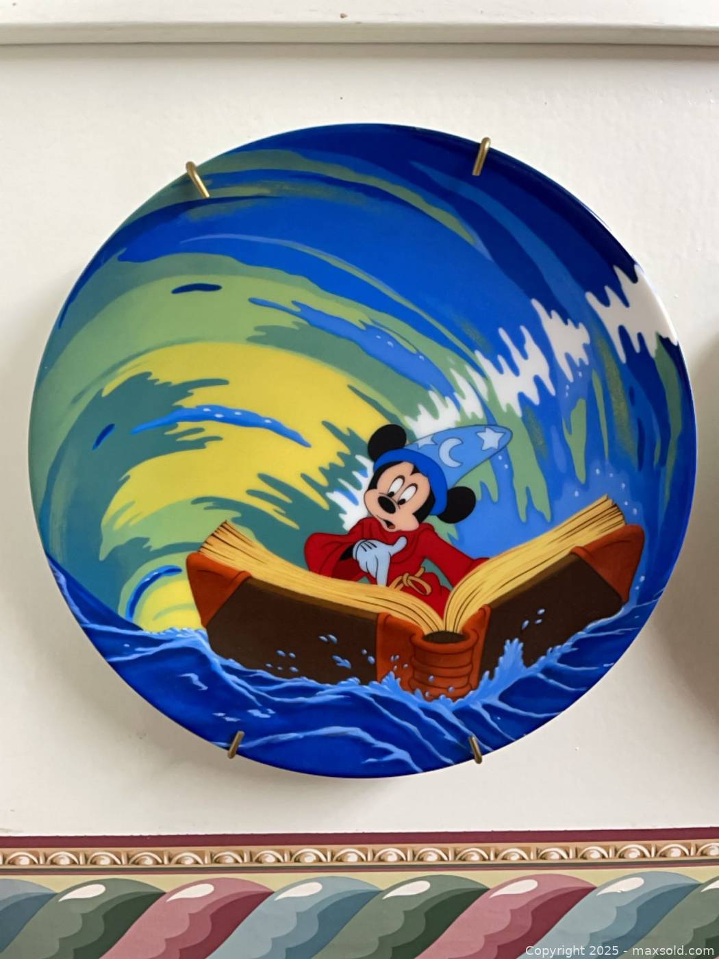 Four numbered Disney Mickey Mouse collector plates | Maxsold