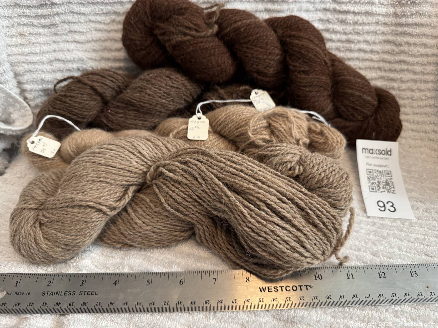 4 skeins wool yarn shades of brown | Maxsold