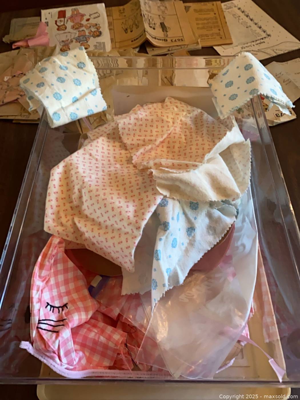 Vintage sewing patterns, fabric scraps & pins | Maxsold