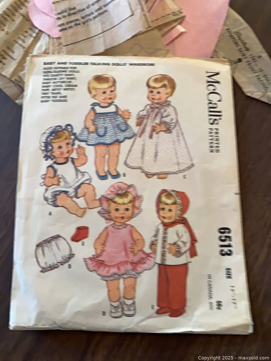 Vintage sewing patterns, fabric scraps & pins | Maxsold