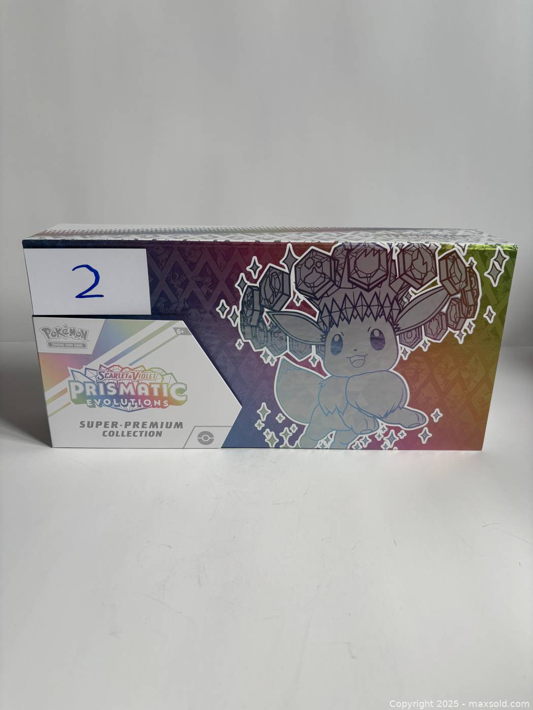 Pokémon Prismatic Evolutions Super-Premium Collection box set opened ...