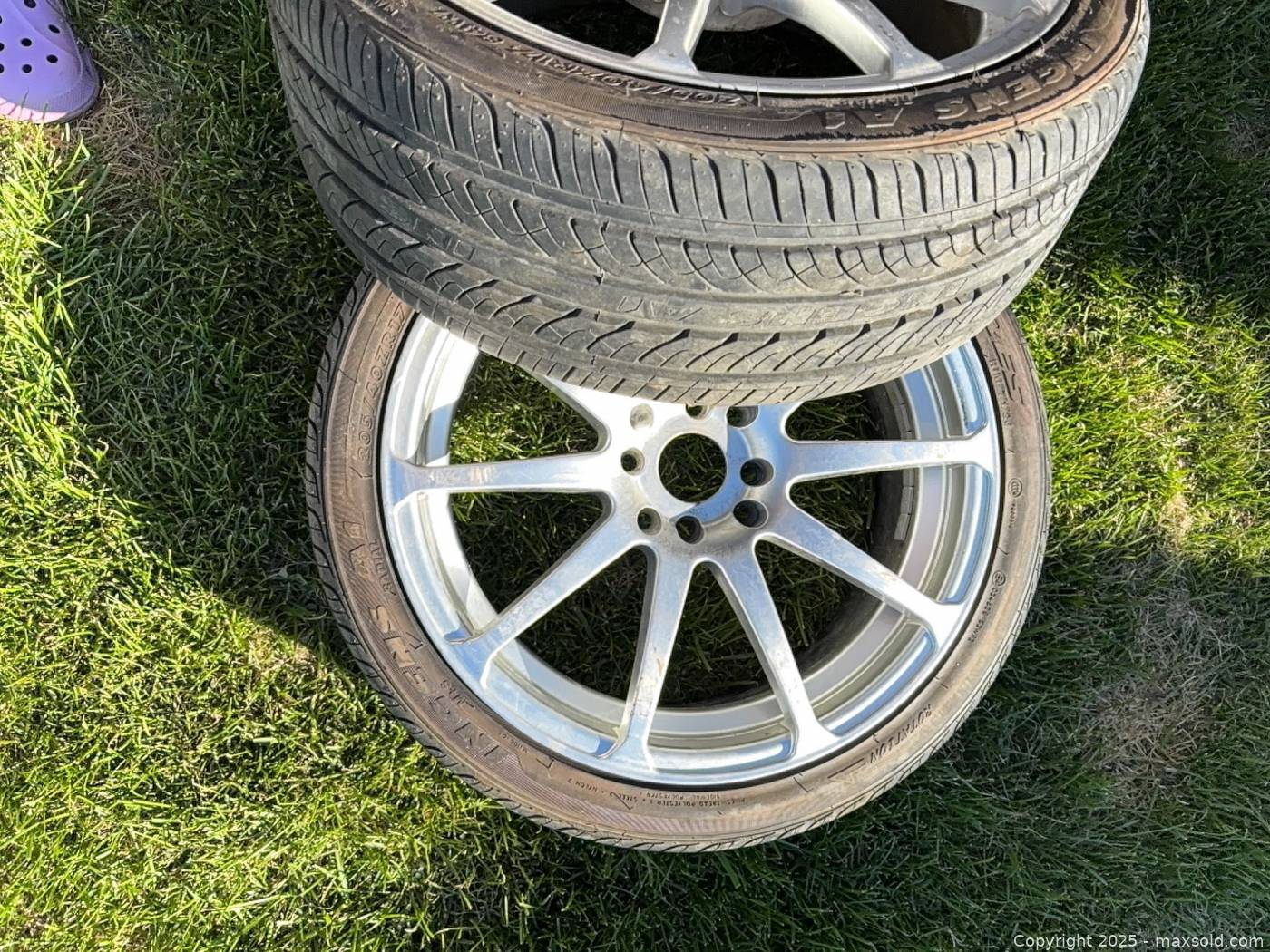 Four 205/40ZR17 summer tires on 17-in aluminum rims | Maxsold