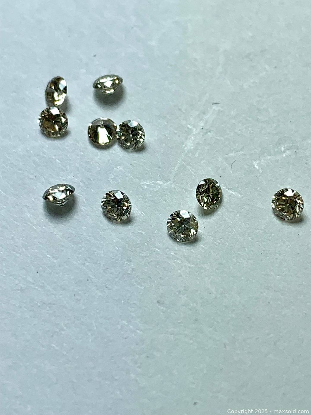 Ten VVS round brilliant diamonds 0.50 ct | Maxsold