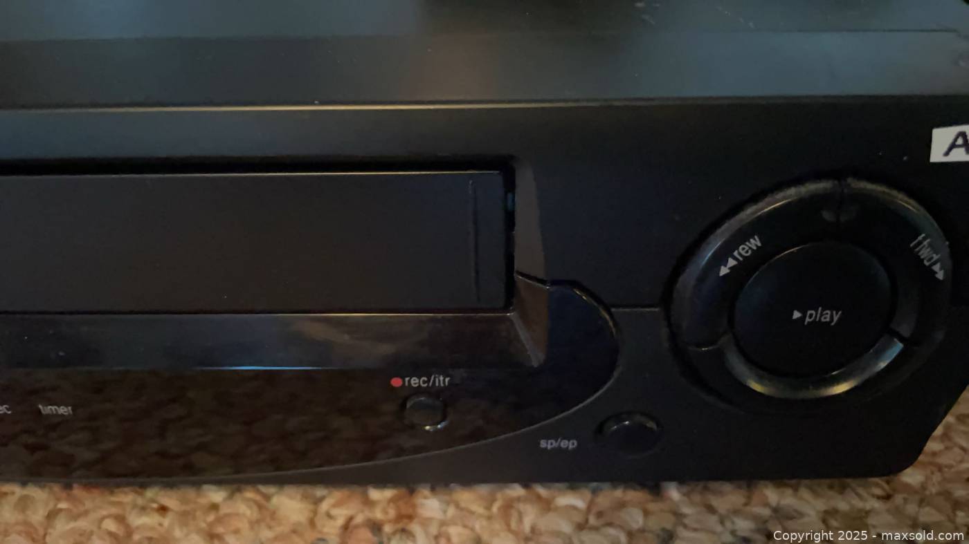 Zenith VHS player, Samsung DVD recorder and Blu-ray player with remotes ...