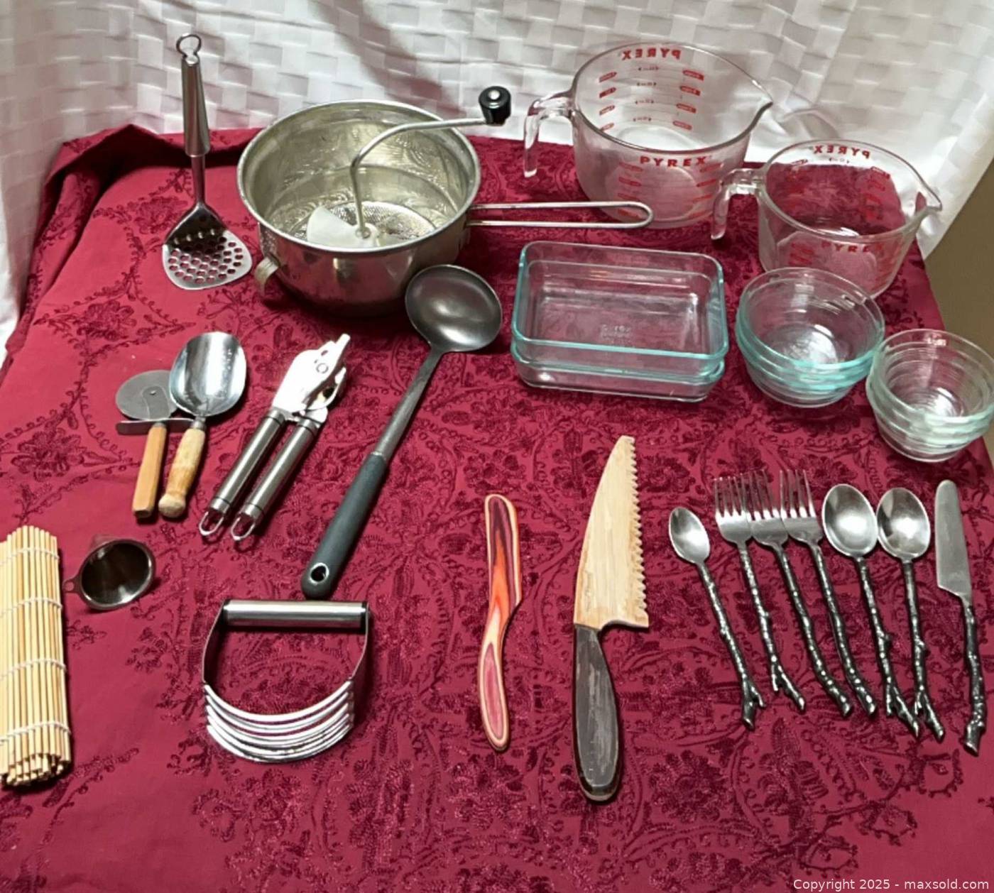 Pyrex measuring cups, glass bakeware and assorted kitchen utensils ...