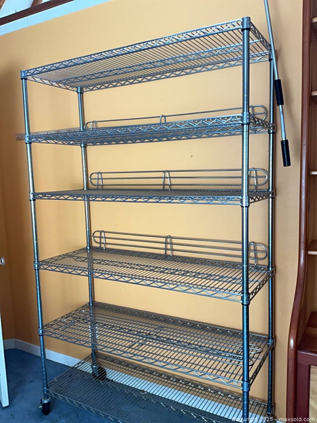 Rolling metal wire shelving unit on casters | Maxsold