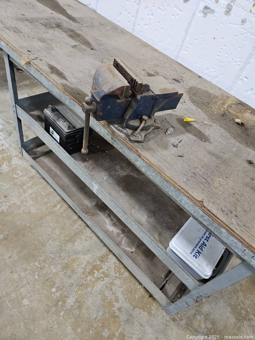 Rolling work table, vise, battery, first aid kit | Maxsold