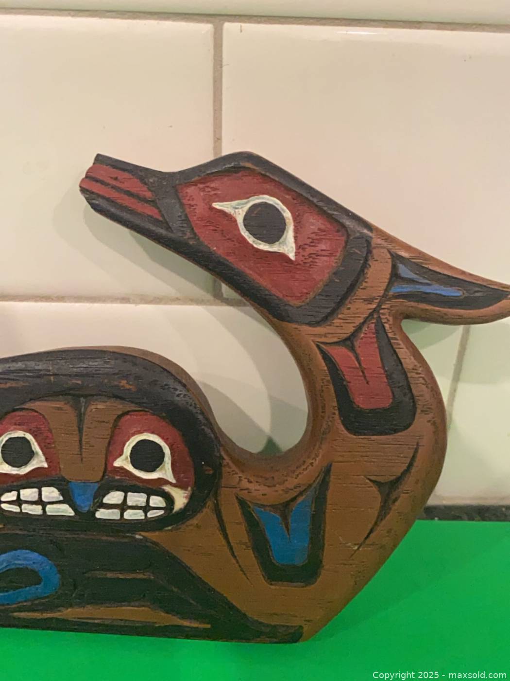 Vintage Indigenous hand carved wood plaque | Maxsold