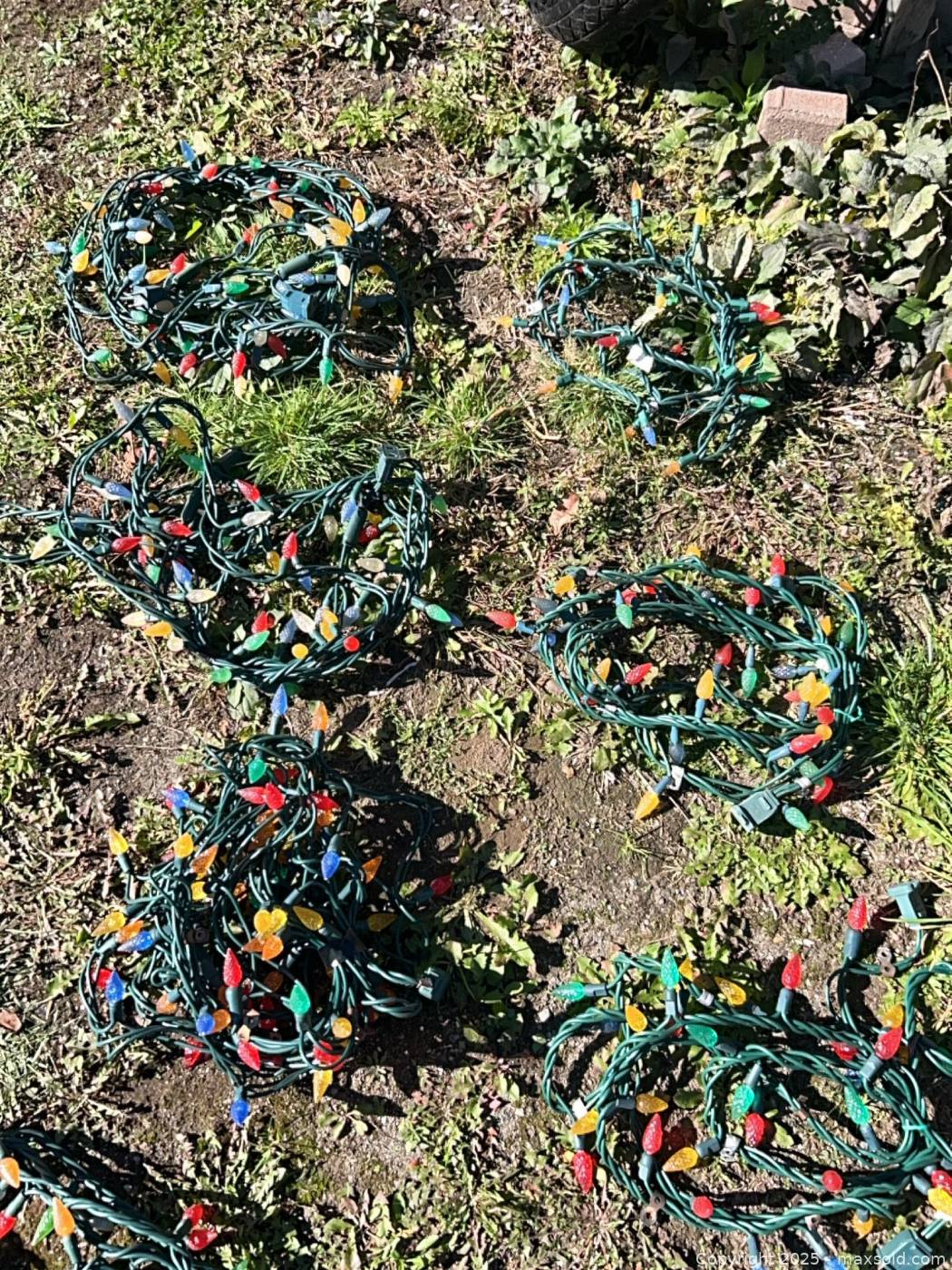 13 multicolor holiday string light strands | Maxsold
