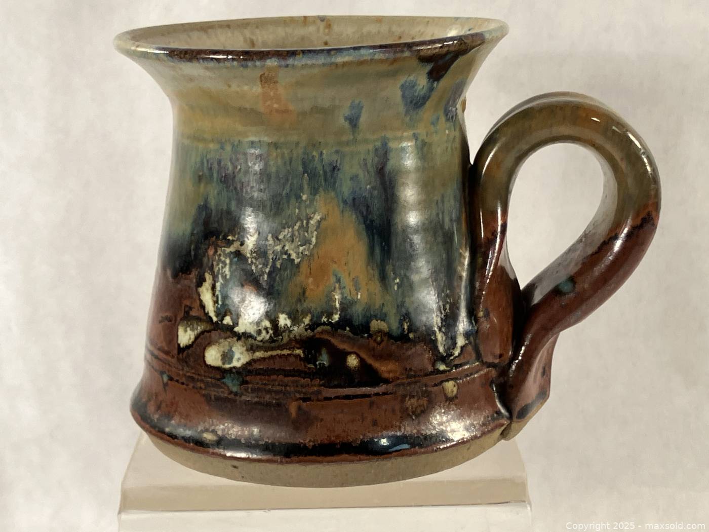 Howard Houle stoneware coffee mug | Maxsold
