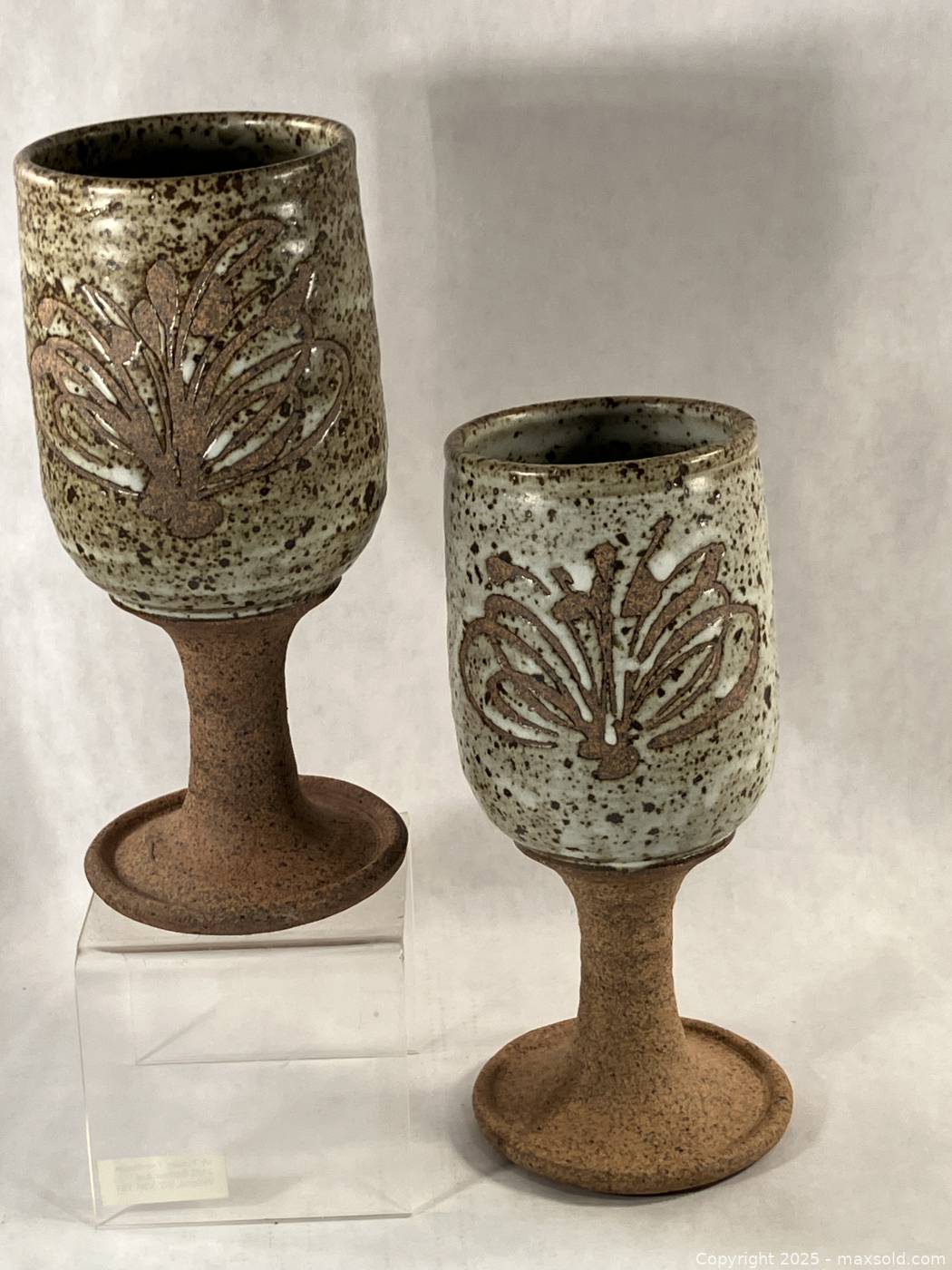 Linda Mackie stoneware goblets pair | Maxsold