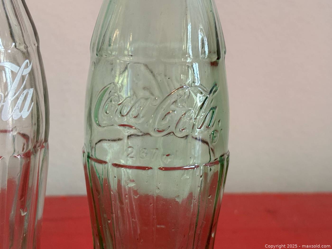 Coca-Cola contour glass soda bottles | Maxsold