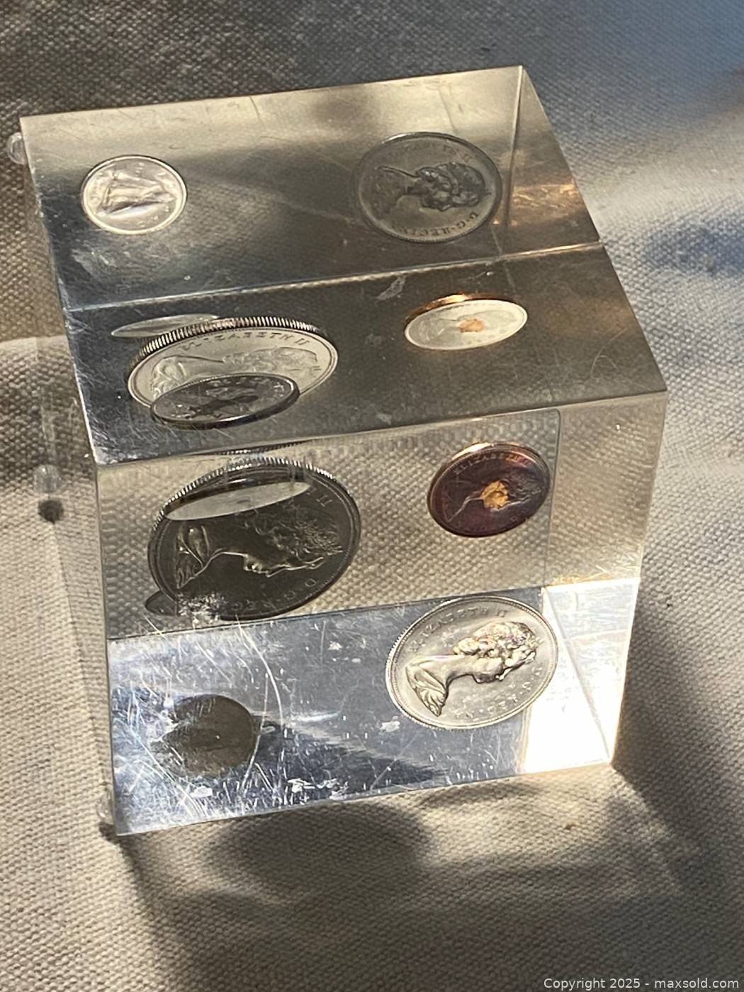 1970 Canadian acrylic coin cube | Maxsold