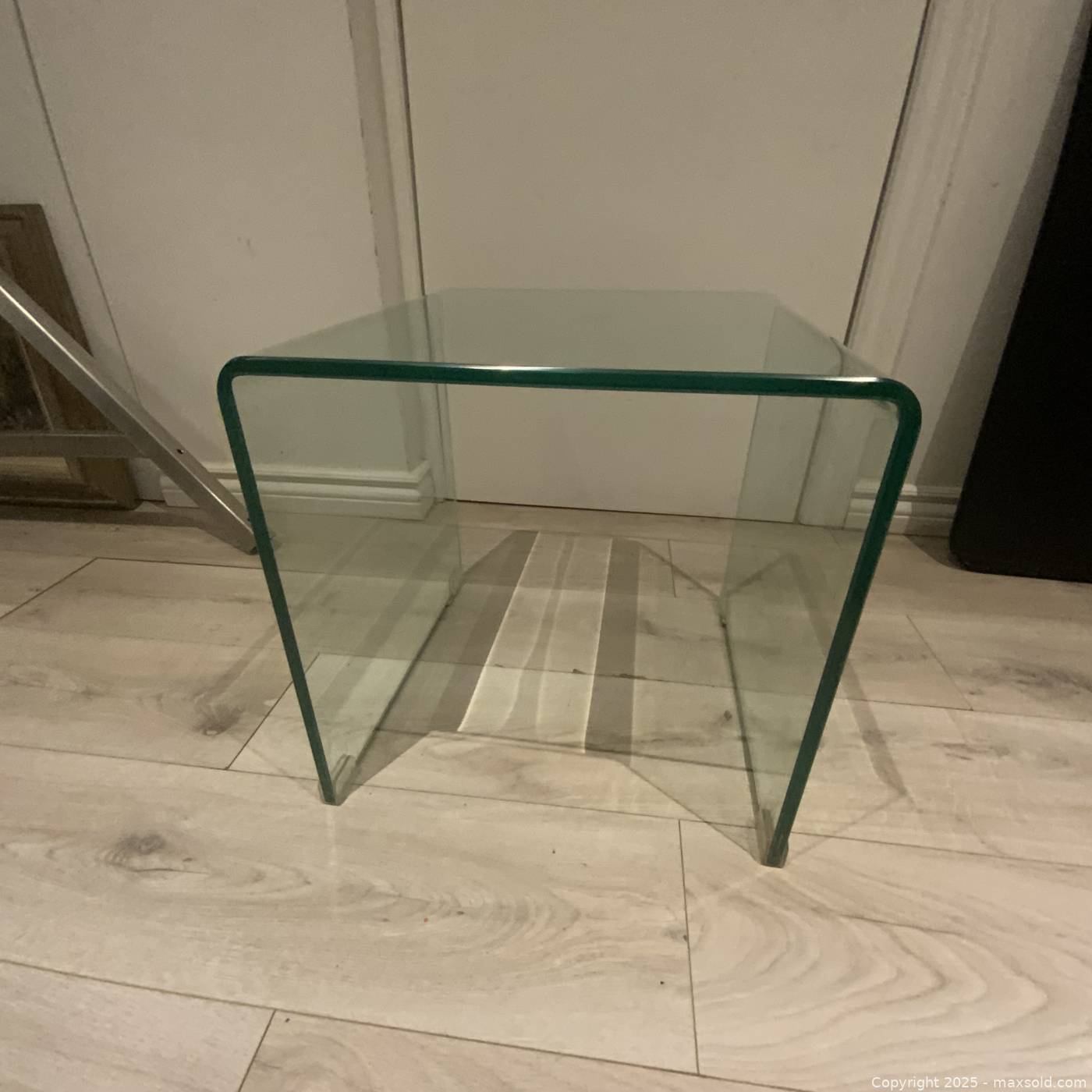 Bent glass waterfall side table | Maxsold