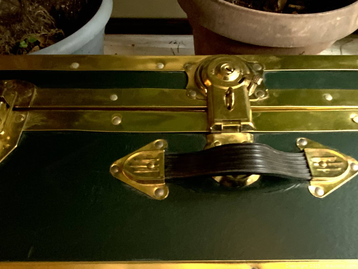 Vintage Everlite green and gold steam trunk | Maxsold