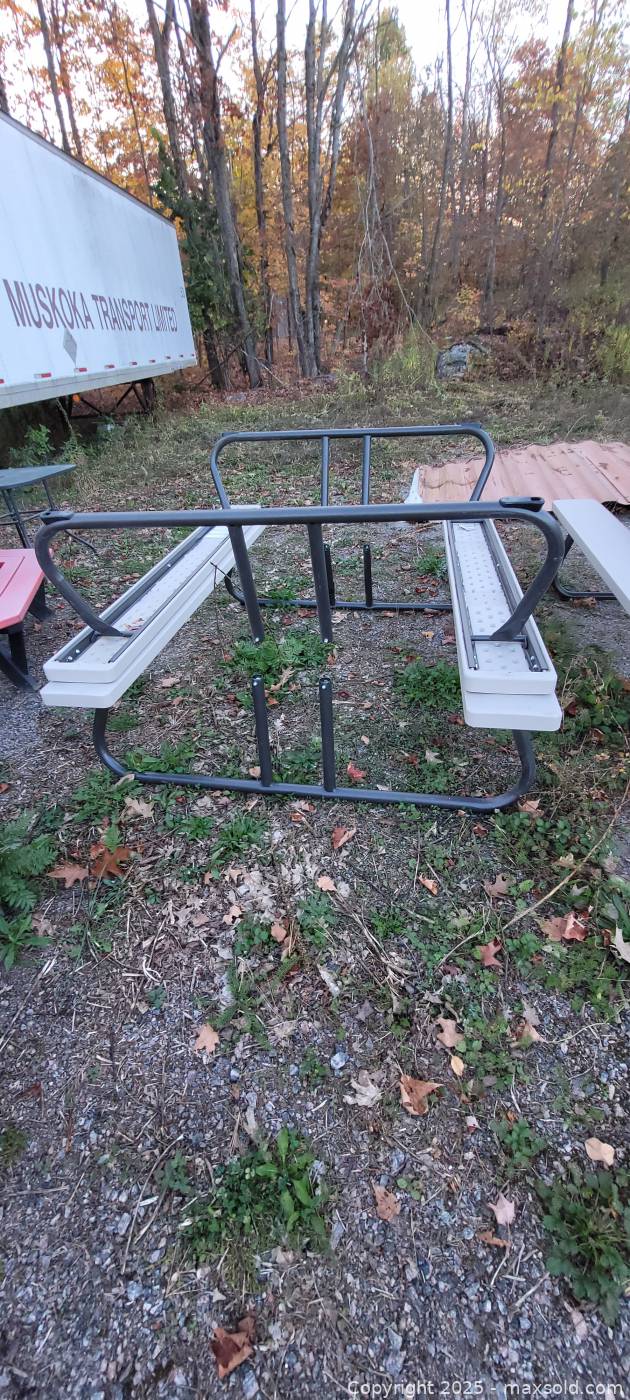 Two picnic table frames with resin benches | Maxsold