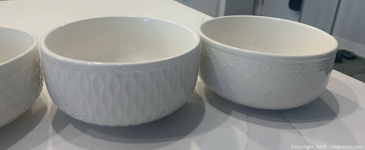 Set of Four White Embossed Ceramic Bowls | Maxsold