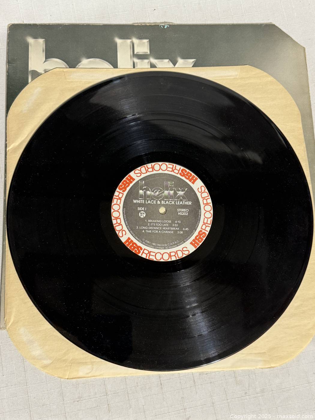 Helix White Lace & Black Leather LP vinyl | Maxsold