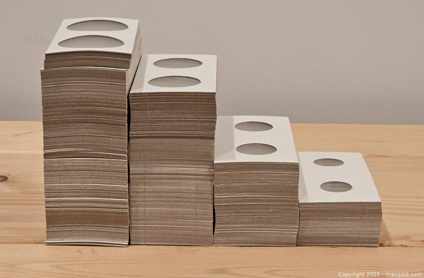Assorted 2x2 cardboard coin holders, four window sizes | Maxsold