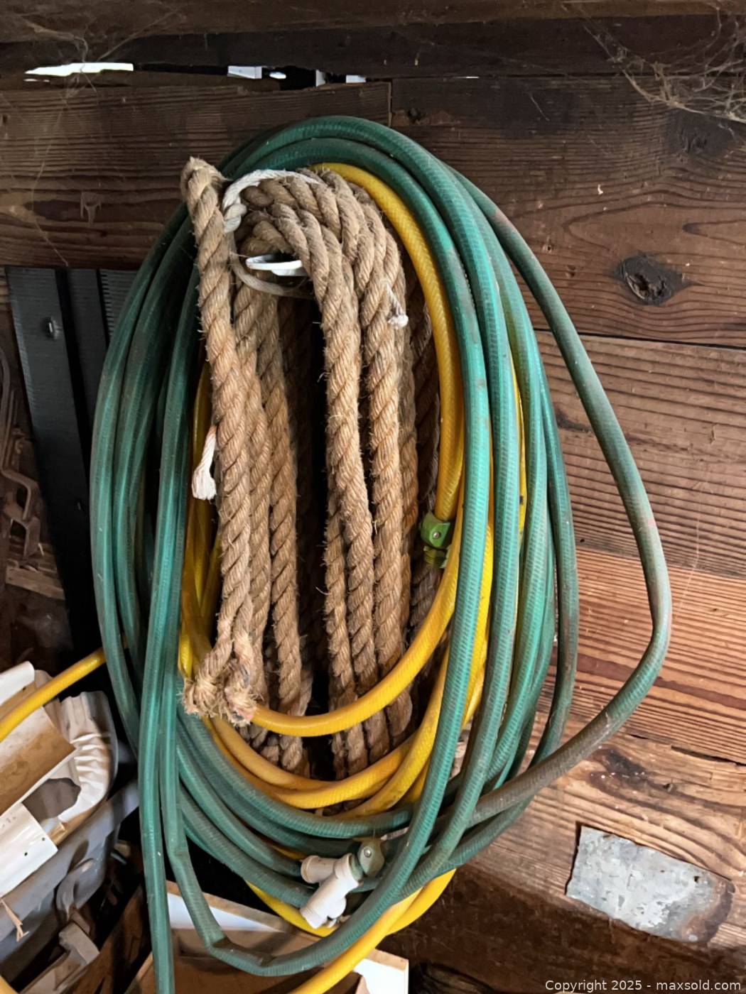 Gutter pieces, garden hoses, rope and concrete mix | Maxsold