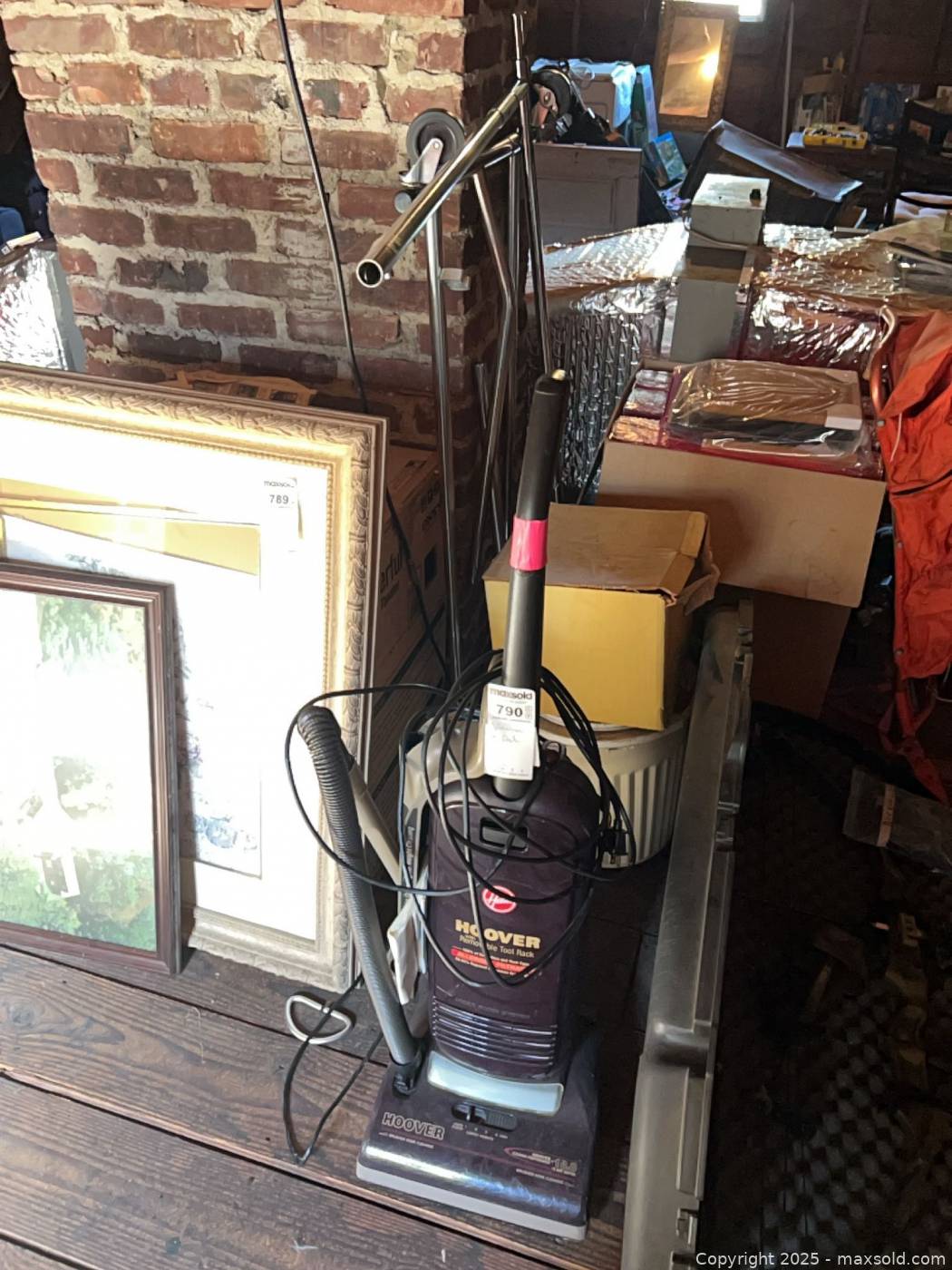 Hoover upright vacuum and garment rack | Maxsold