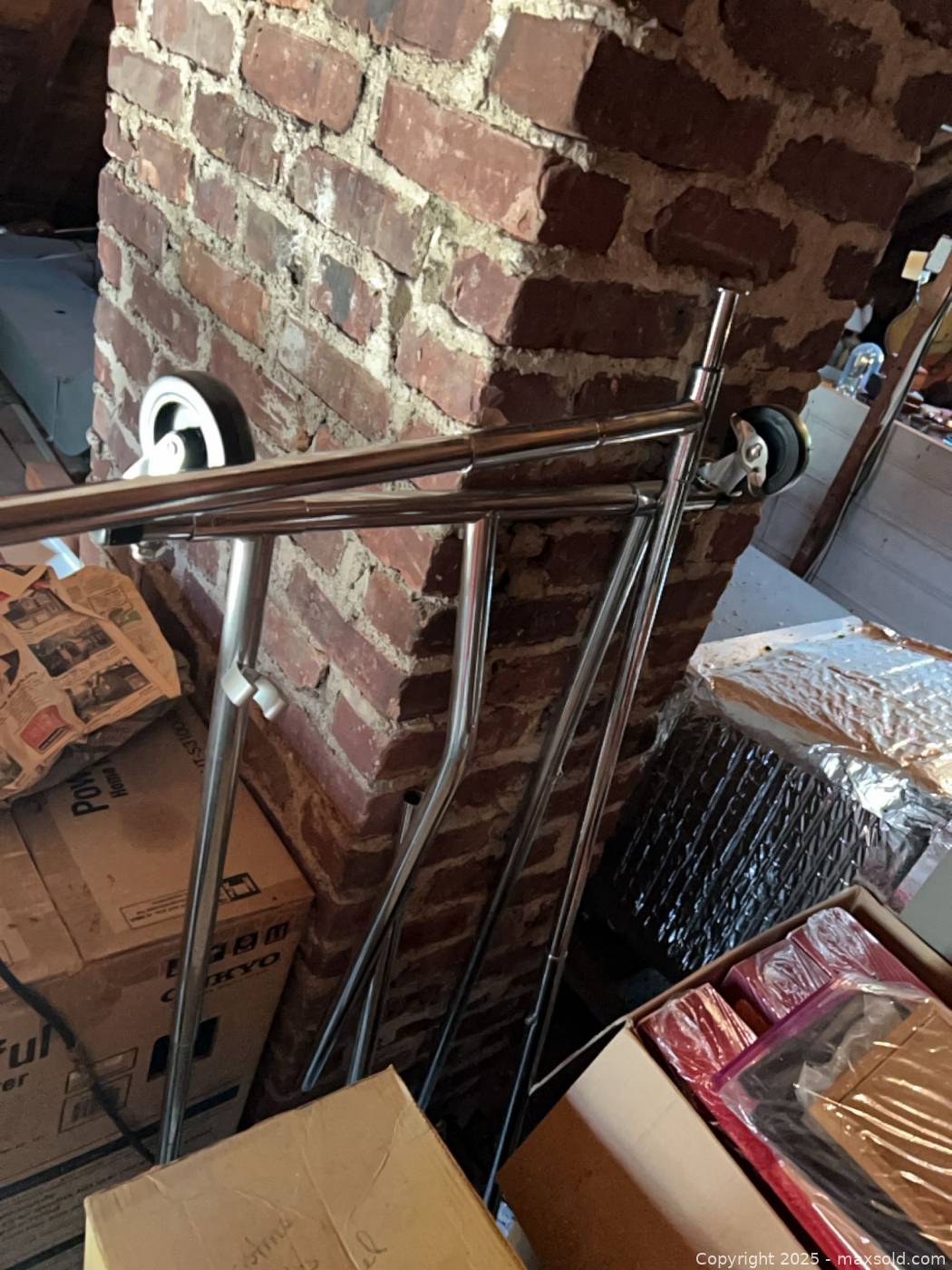 Hoover upright vacuum and garment rack | Maxsold