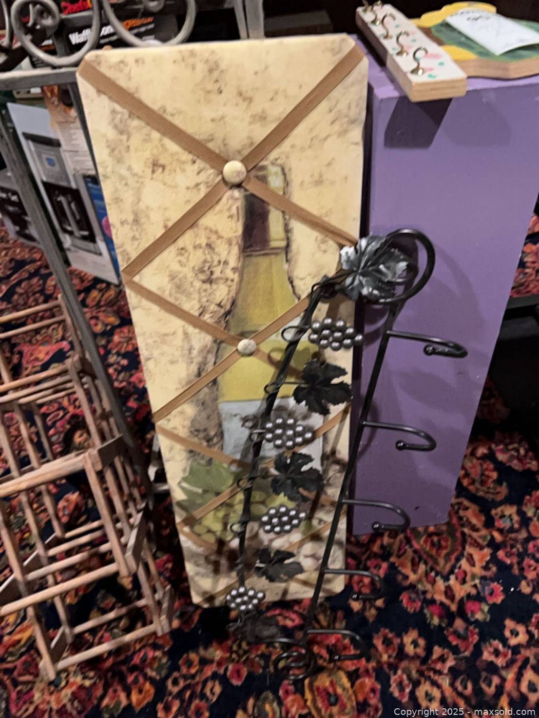 Stand, wine rack, hooks, picture board, ceramic plates | Maxsold