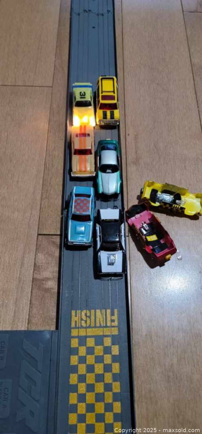 TCR slotless racing track, cars, controllers | Maxsold