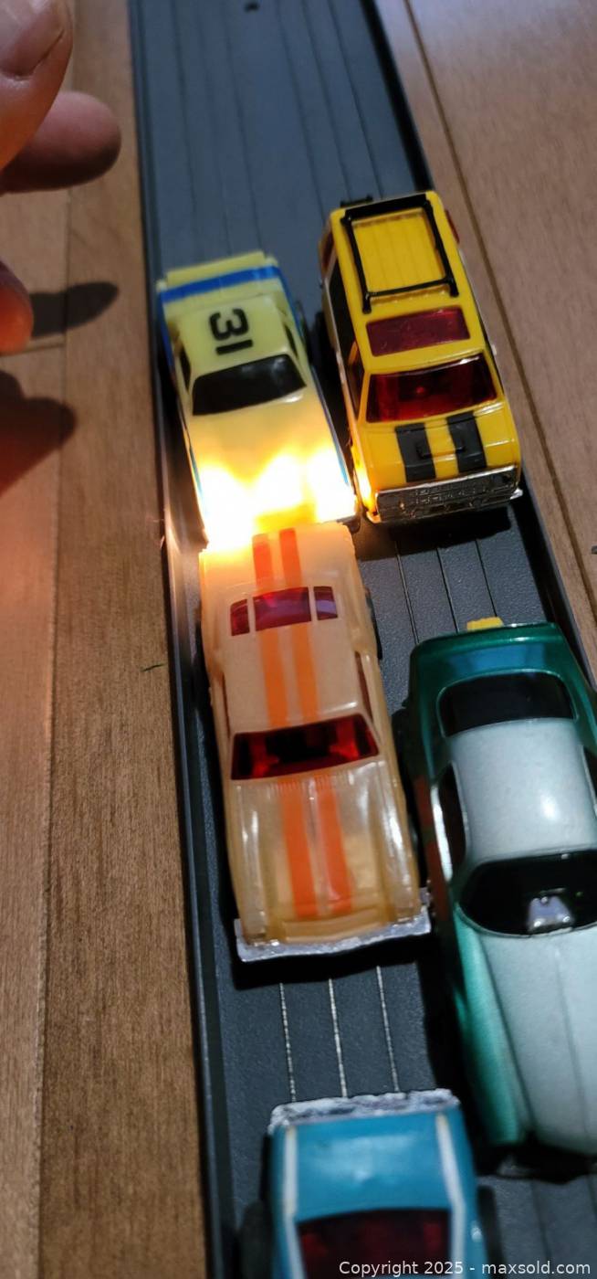 TCR slotless racing track, cars, controllers | Maxsold