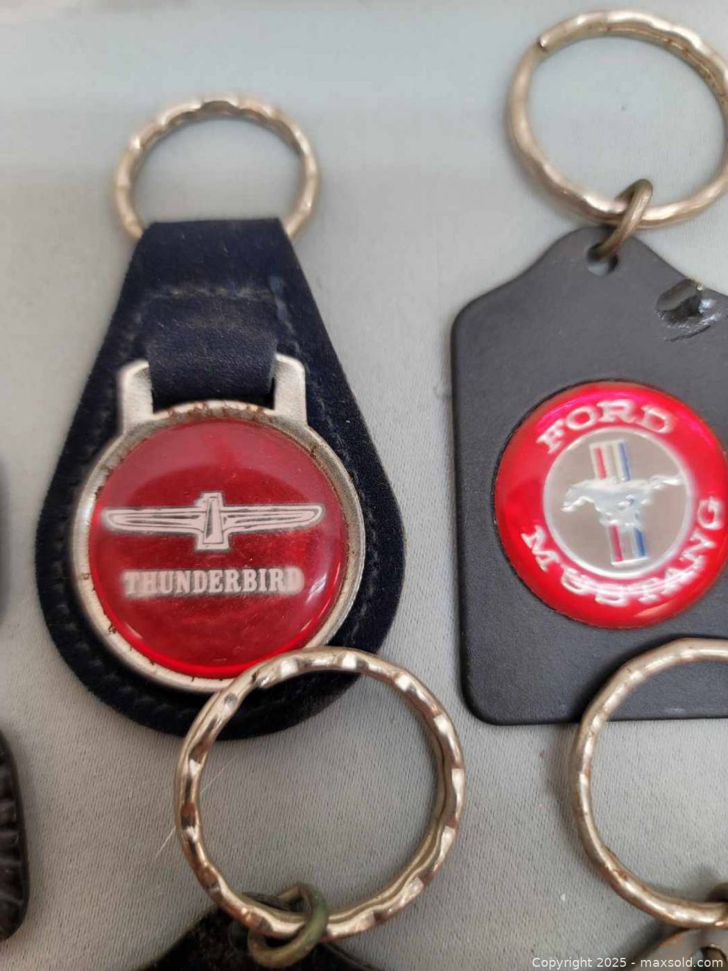 Assorted vintage keychains, auto & monogram, ~31 pcs | Maxsold