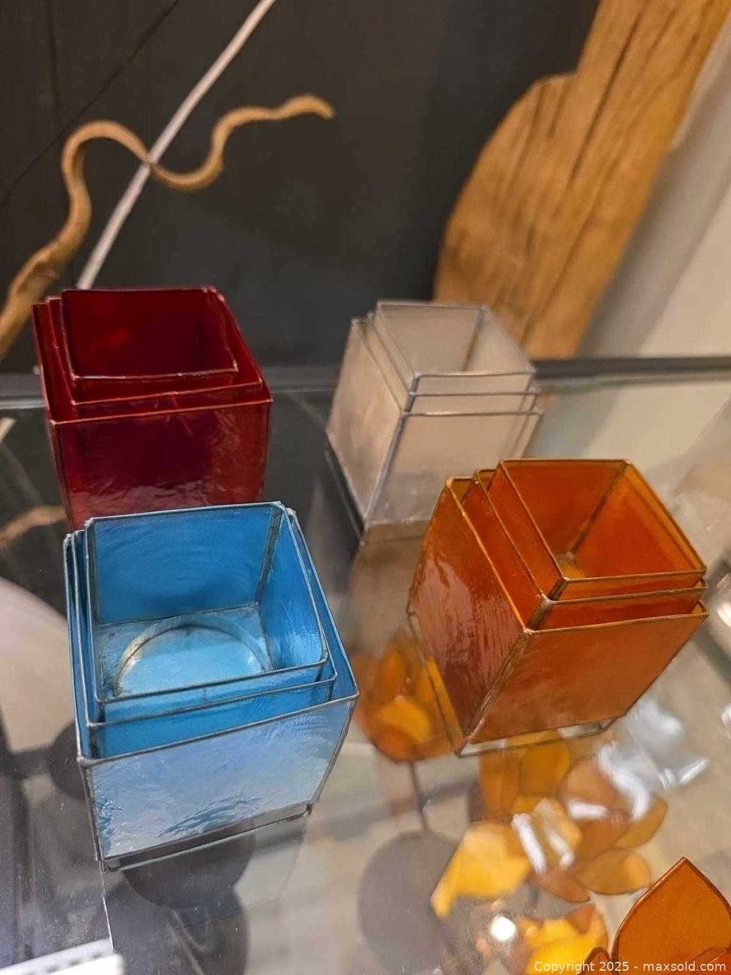 Approx. 65 square colored-glass tealight holders | Maxsold