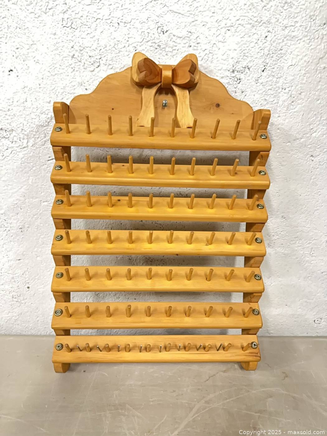 Wooden thread spool rack with 14 spools | Maxsold