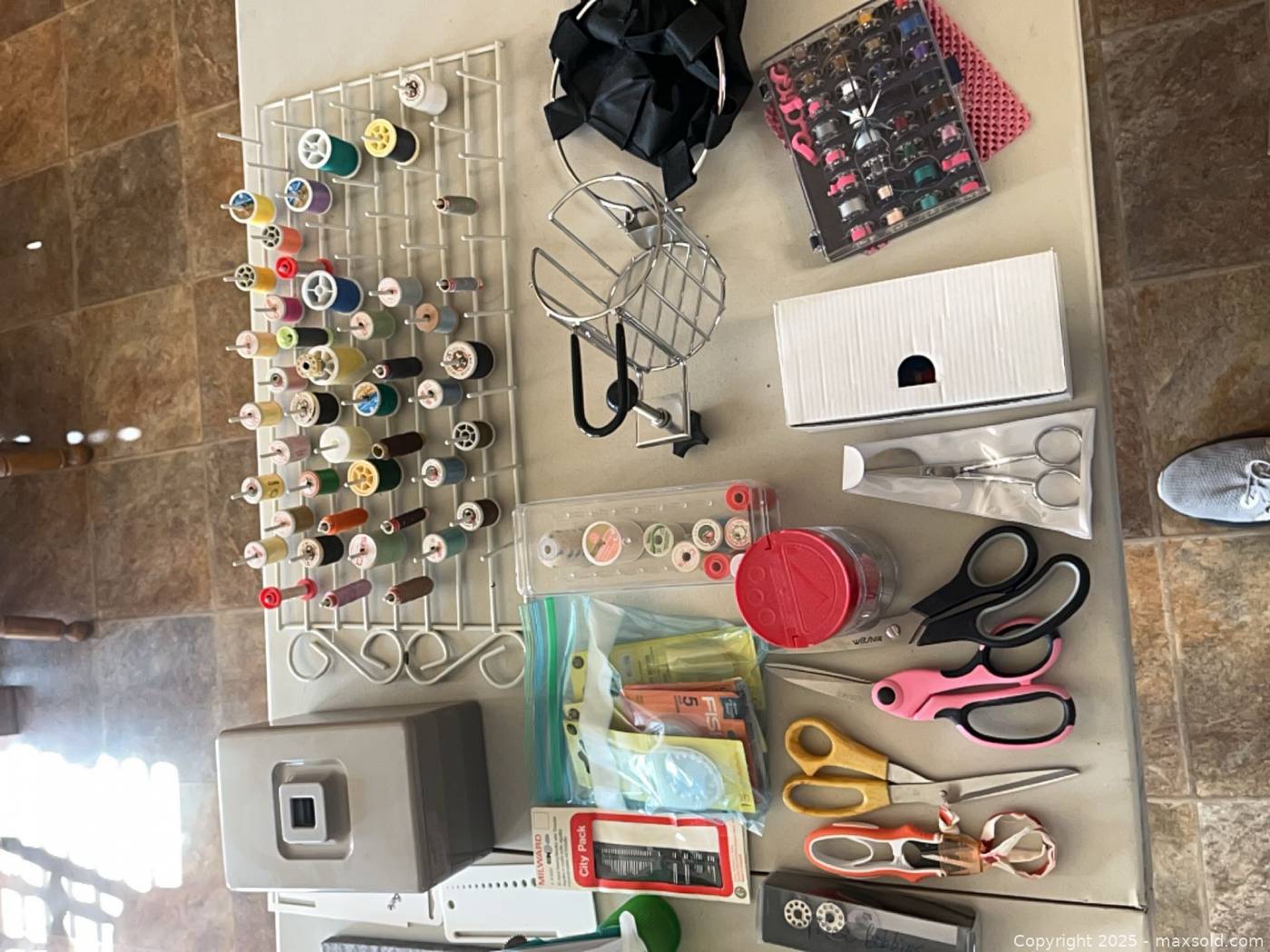 Sewing supplies, thread racks, spools, tools | Maxsold